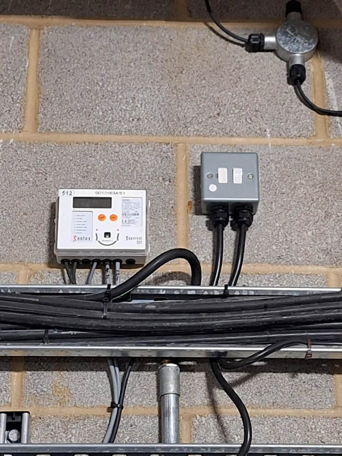 Heat Meter Installations in Mixed-Use Building - Asset Building Services